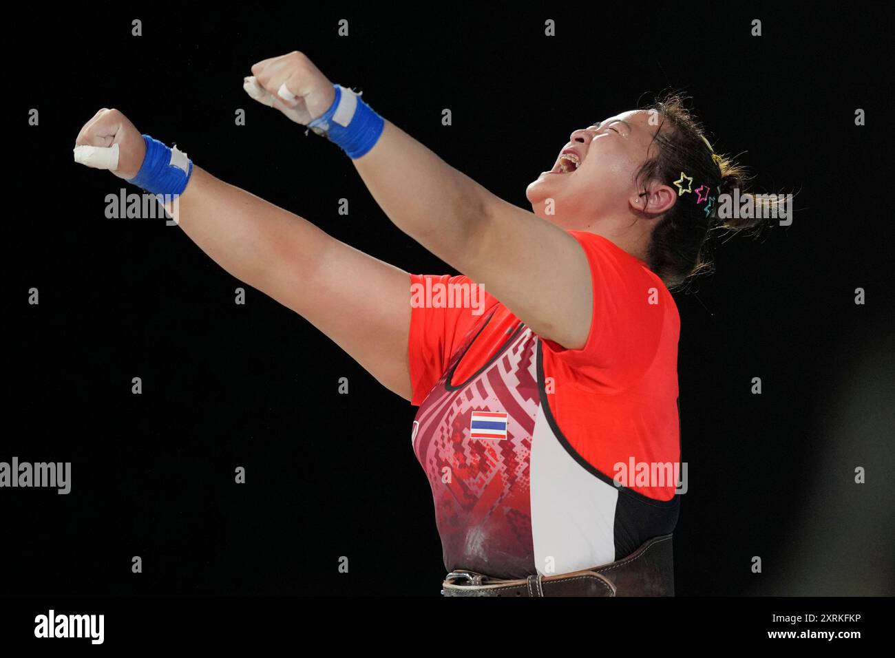 Duangaksorn Chaidee of Thailand reacts during the women's +81kg weightlifting event at the 2024 ...