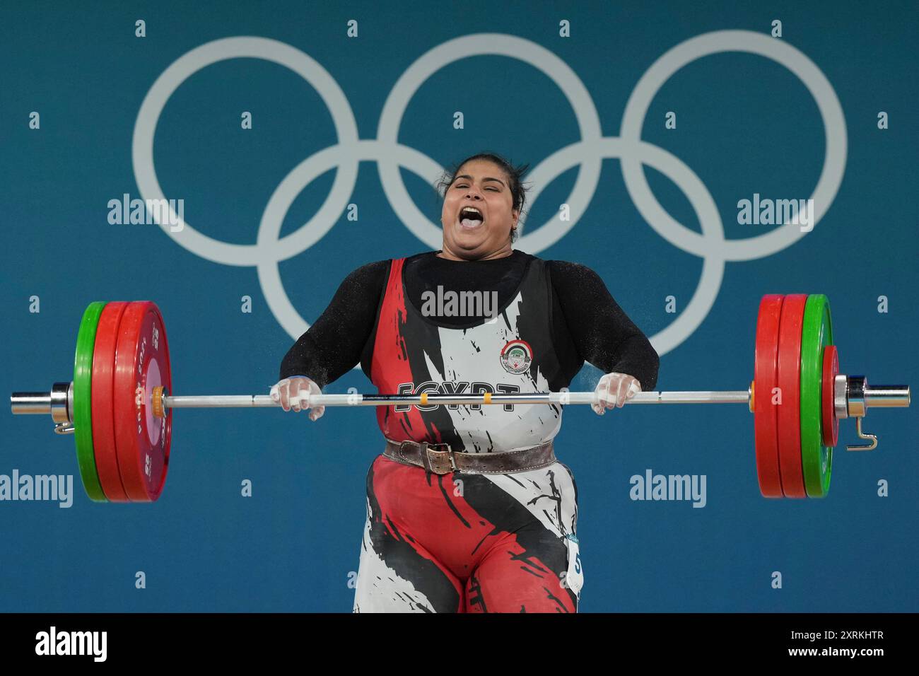 Halima Abbas of Egypt reacts during the women's +81kg weightlifting ...