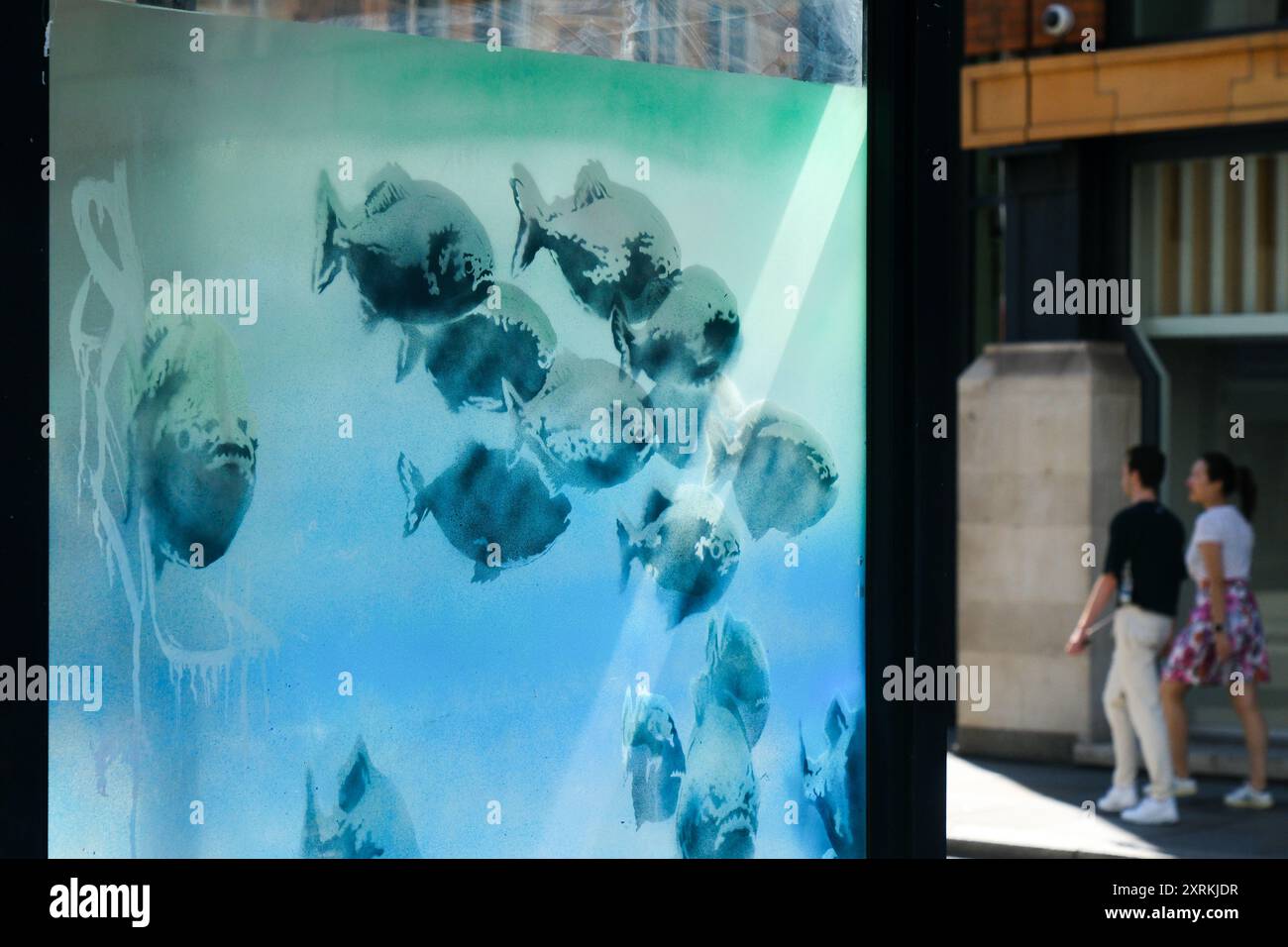 City of London, UK. 11th Aug 2024. 'Banksy' Piranha fish appear in City ...