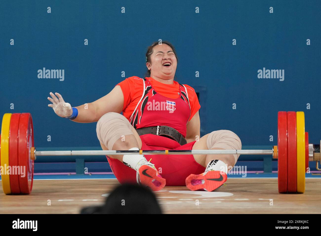 Duangaksorn Chaidee of Thailand reacts after a failed lift during the women's +81kg ...