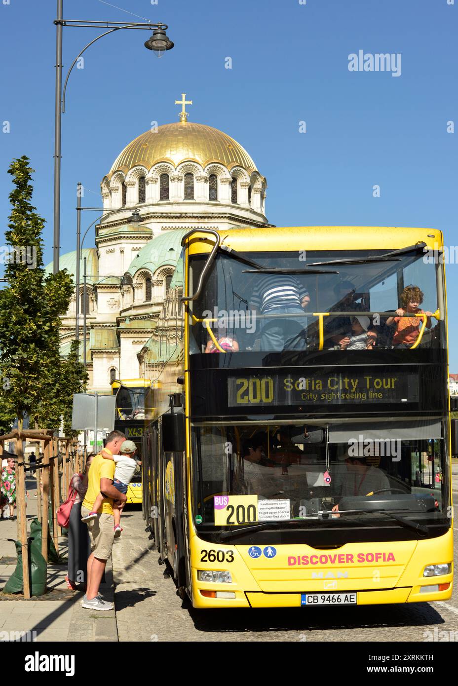 Sofia City Tour bus by Discover Sofia and tourists boarding branded sightseeing bus at St ...