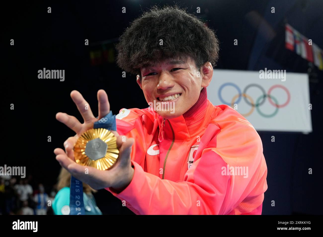 Japan's Kotaro Kiyooka celebrates with his gold medal during the ...