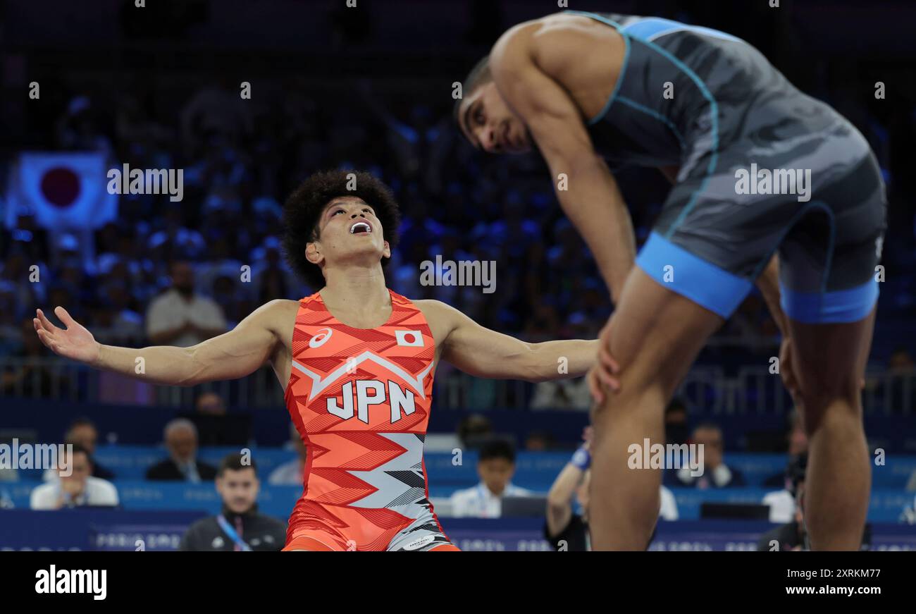 KIYOOKA Kotaro of Japan (in red) reacts after winning the gold medal of ...