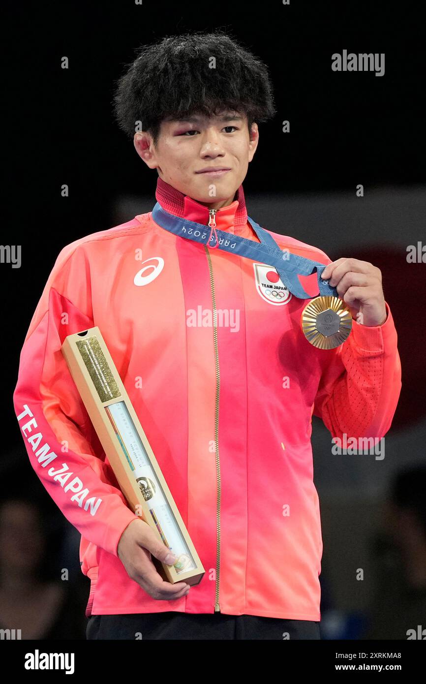 Japan's Kotaro Kiyooka celebrates with his gold medal during the ...