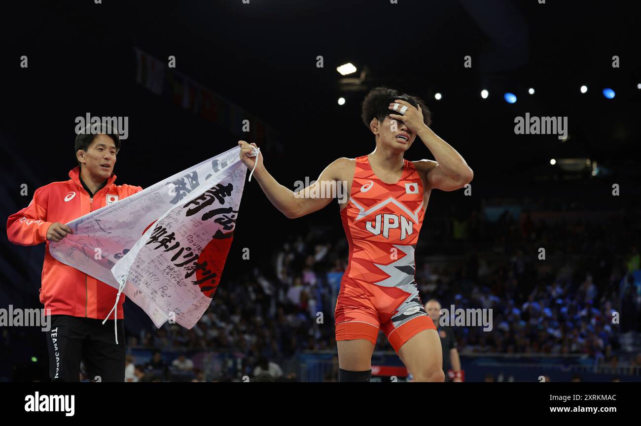 KIYOOKA Kotaro of Japan (R) reacts after winning the gold medal of the ...