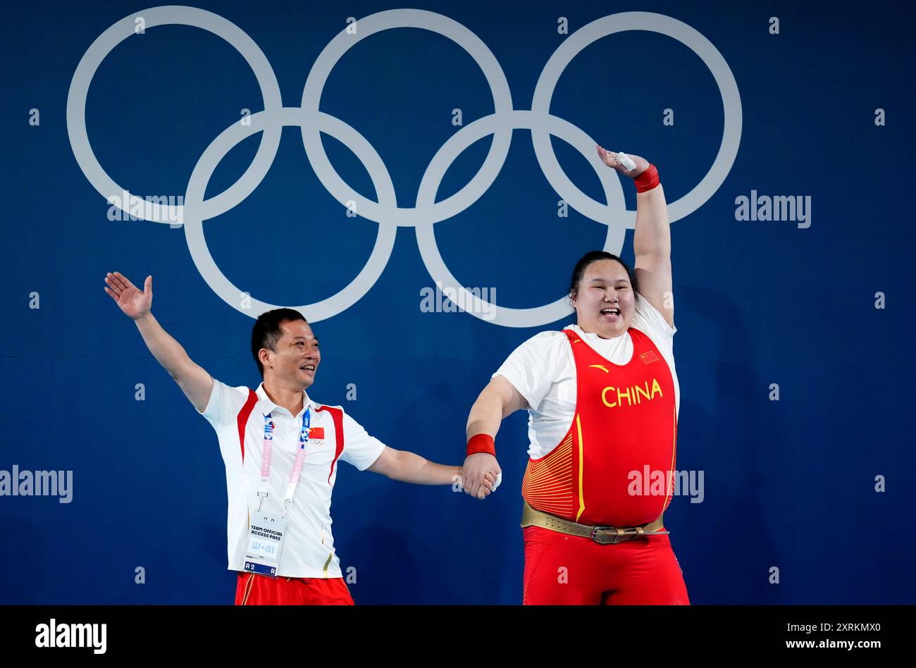 China's Li Wenwen (right) celebrates winning a gold medal following the ...