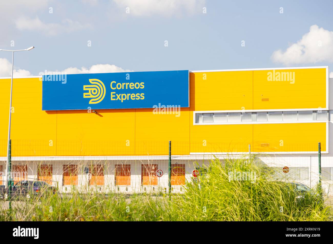 The exterior of a correos express portugal depot with its logo ...