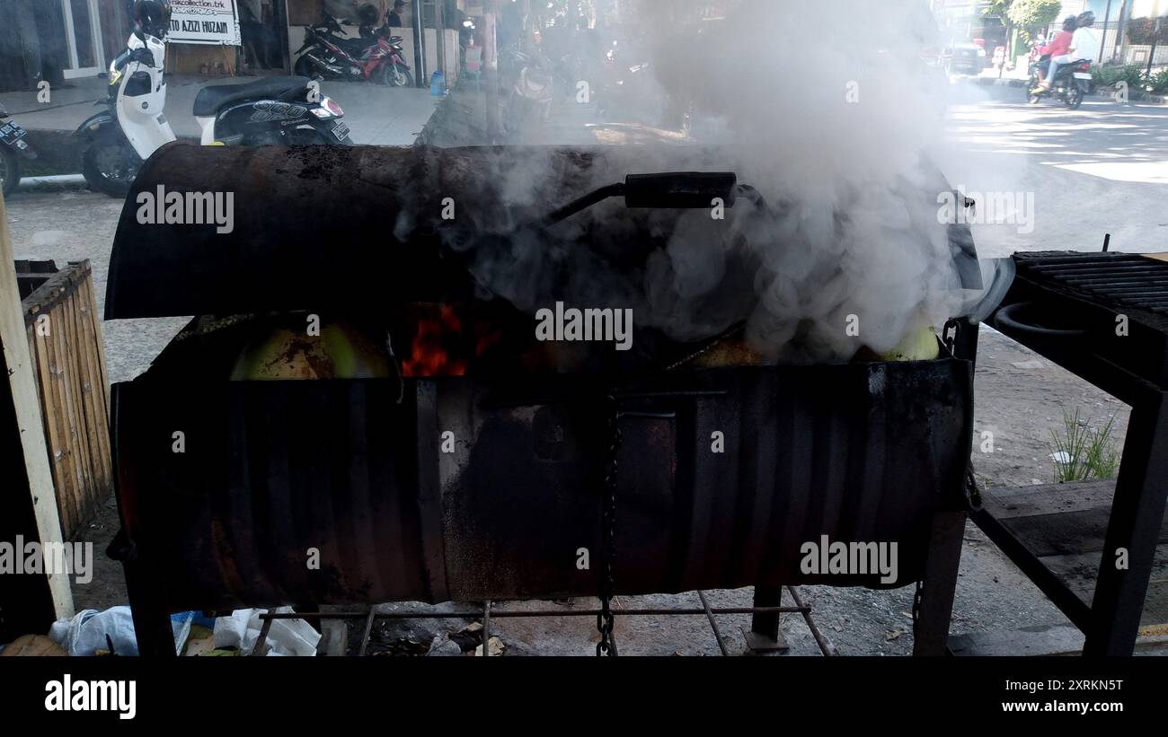 the process of burning coconuts which are then mixed with special ...