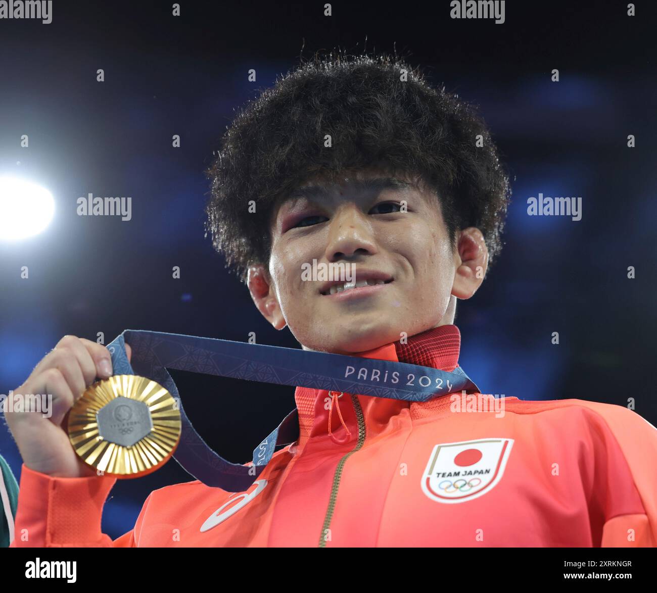 KIYOOKA Kotaro of Japan, the gold medalist, poses for cameras during a ...