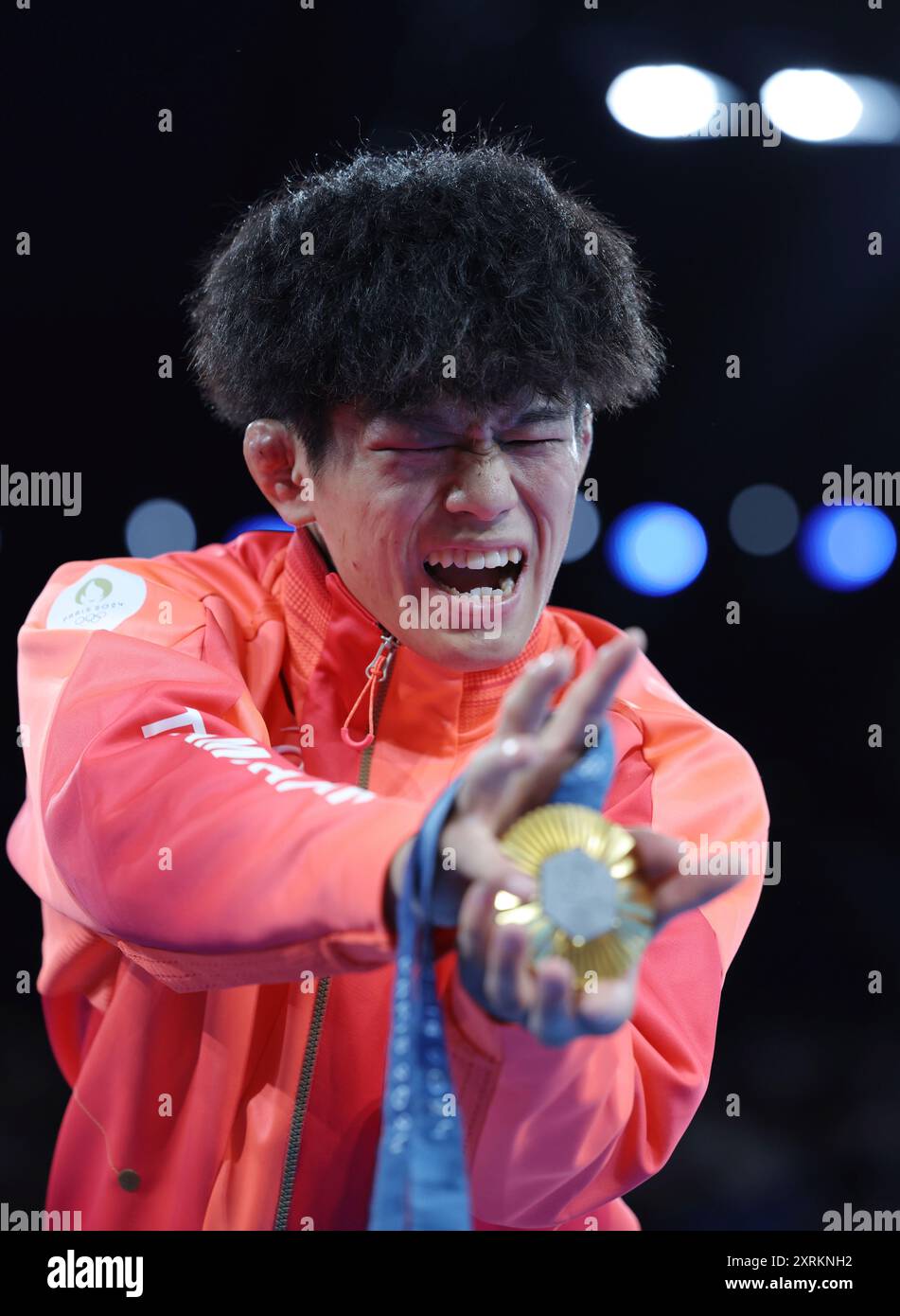 KIYOOKA Kotaro of Japan, the gold medalist, poses for cameras during a ...