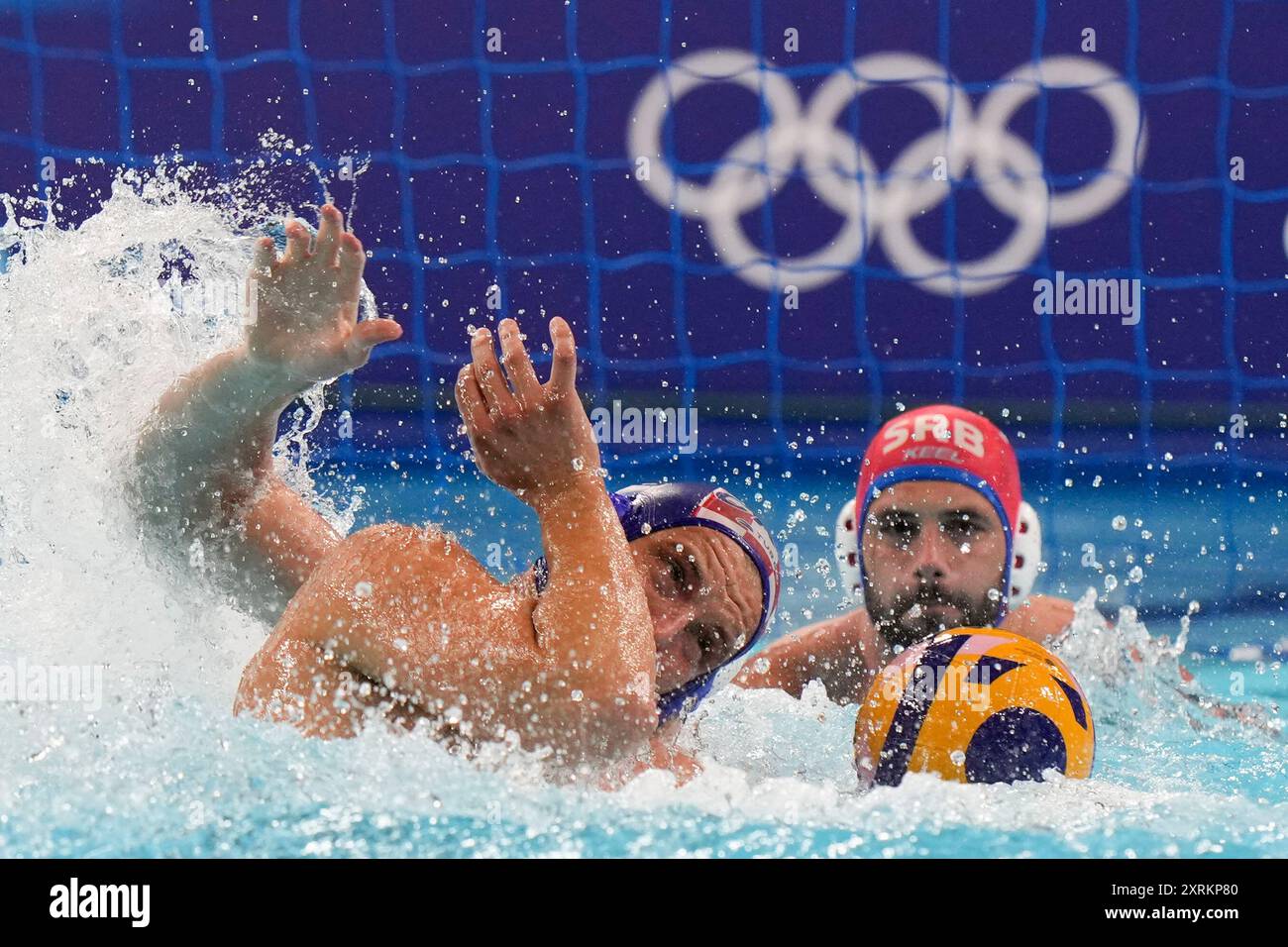 Croatia's Luka Loncar, left, and Serbia's Sava Randelovic fight for the ...
