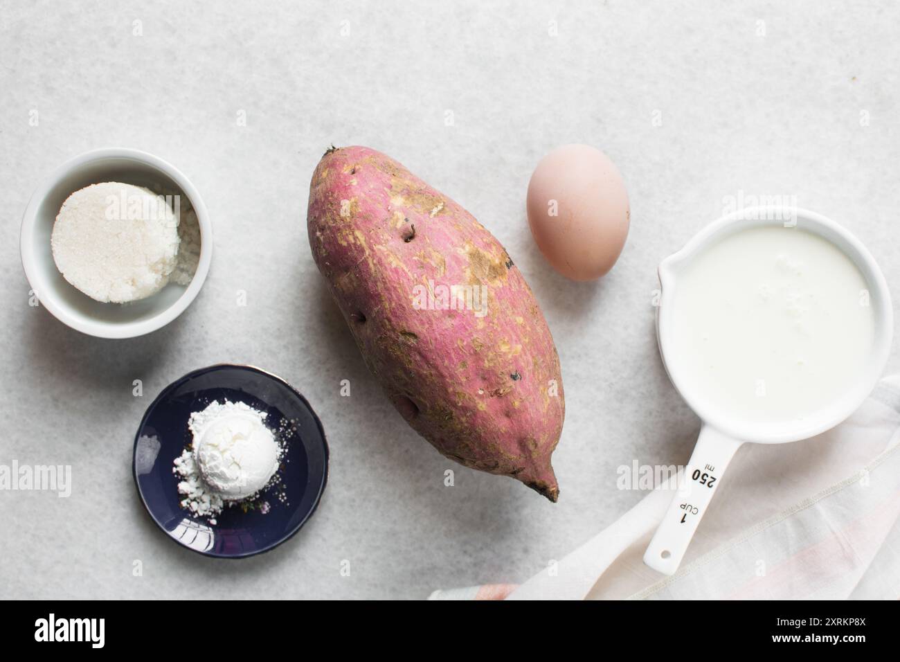 Overhead view of ingredients for making sweet potato creme brulee ...