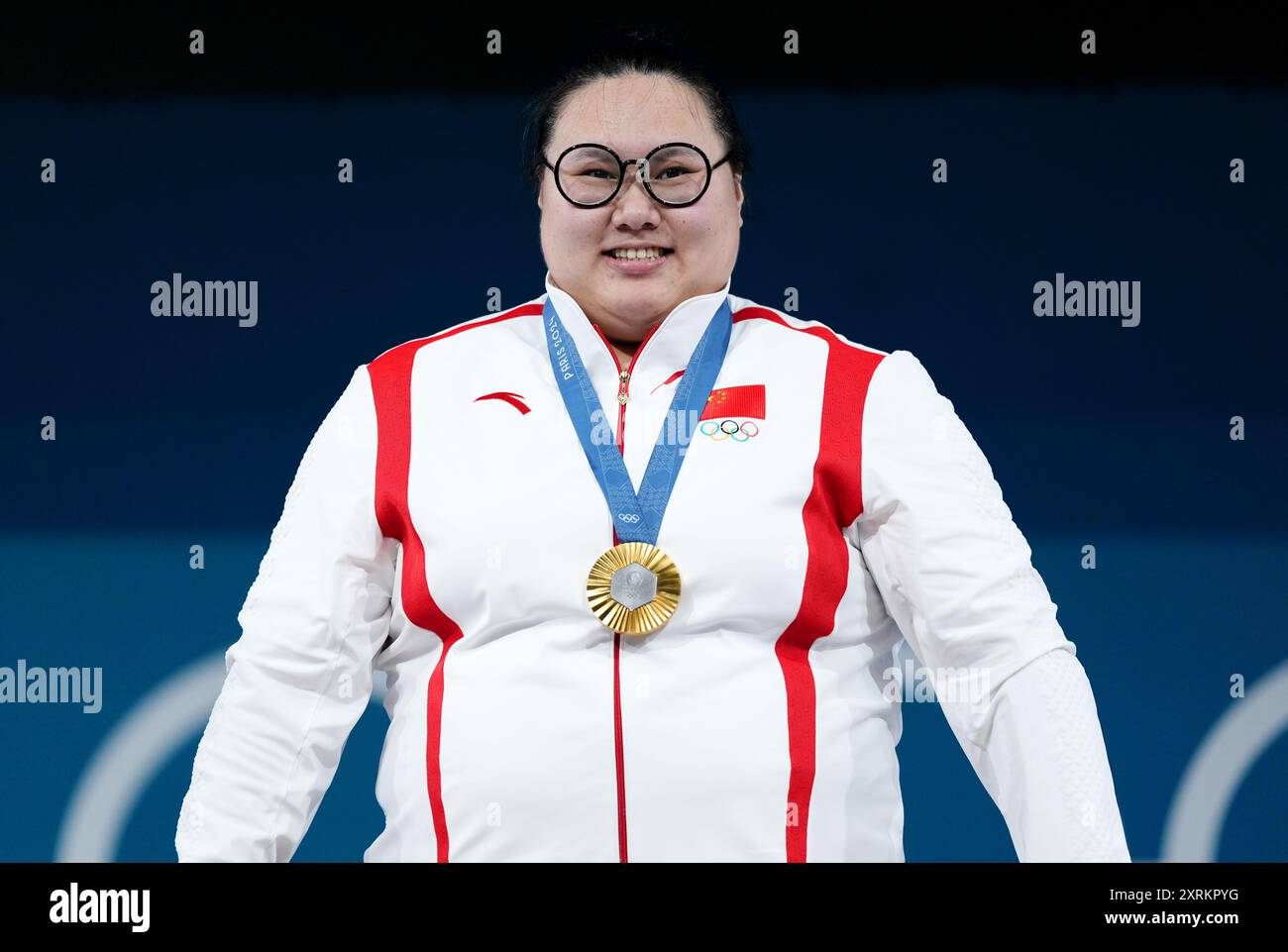 Gold Medallist, Li Wenwen of China following the Women's Weightlifting ...