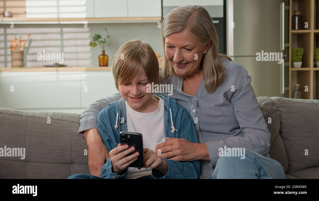 Happy family elderly senior Caucasian woman retired female talking hug ...