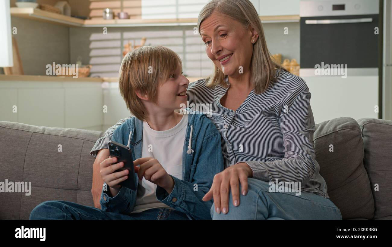 Happy family elderly senior Caucasian woman retired female talking hug ...