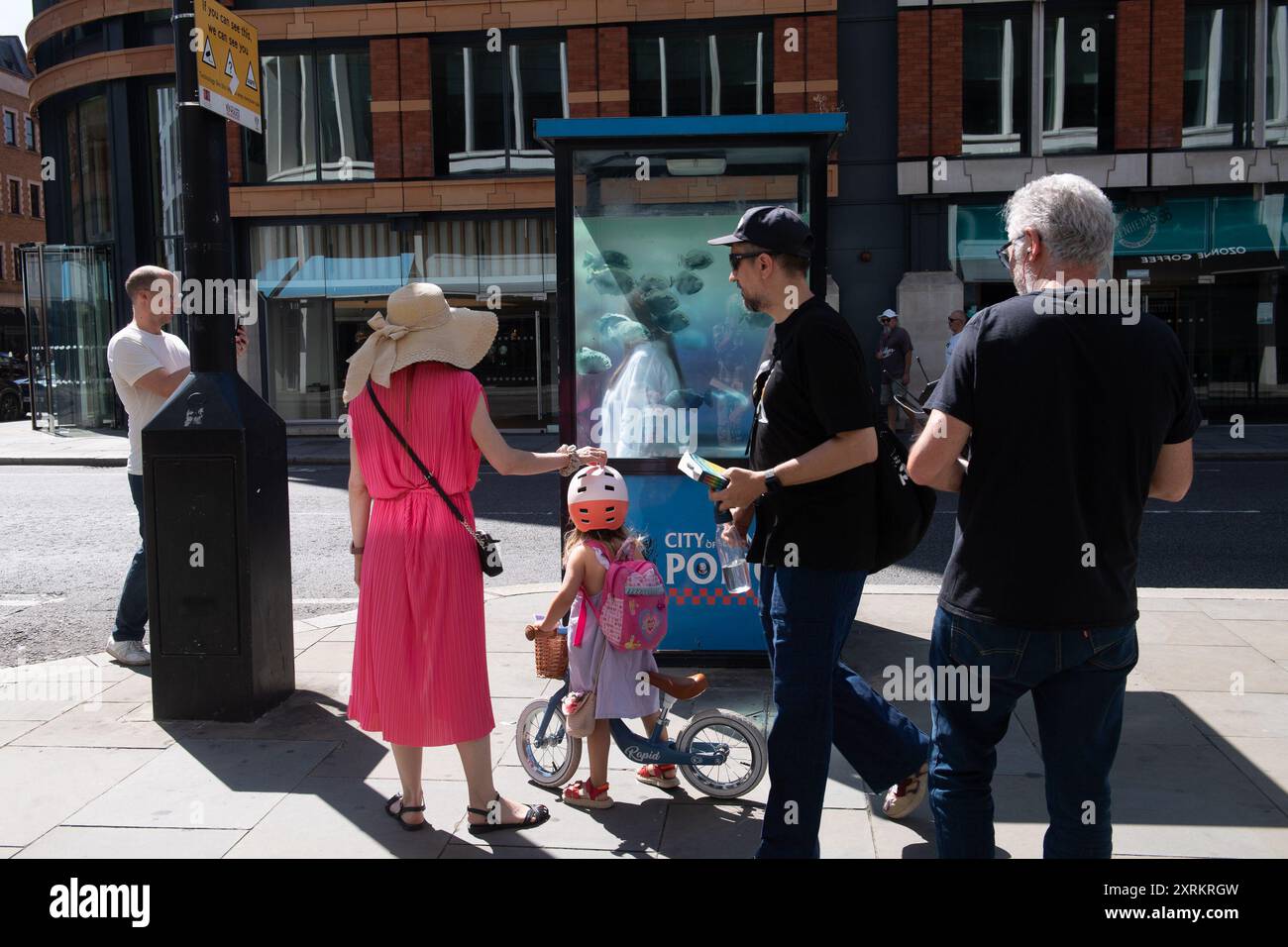 London, UK. 11th Aug, 2024. People take photos of Street Artist Banksy ...