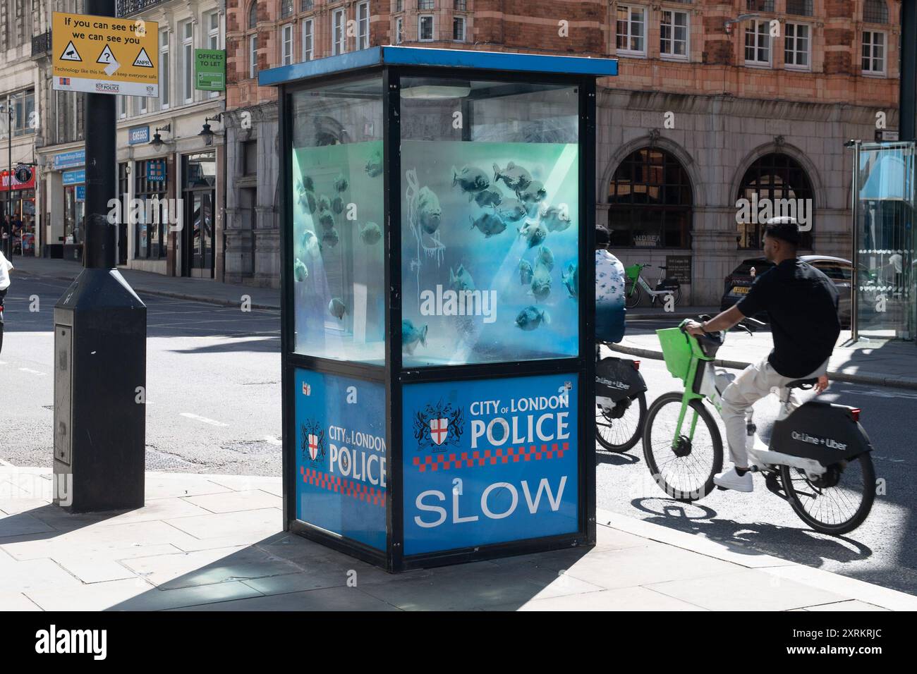 London, UK. 11th Aug, 2024. People take photos of Street Artist Banksy ...