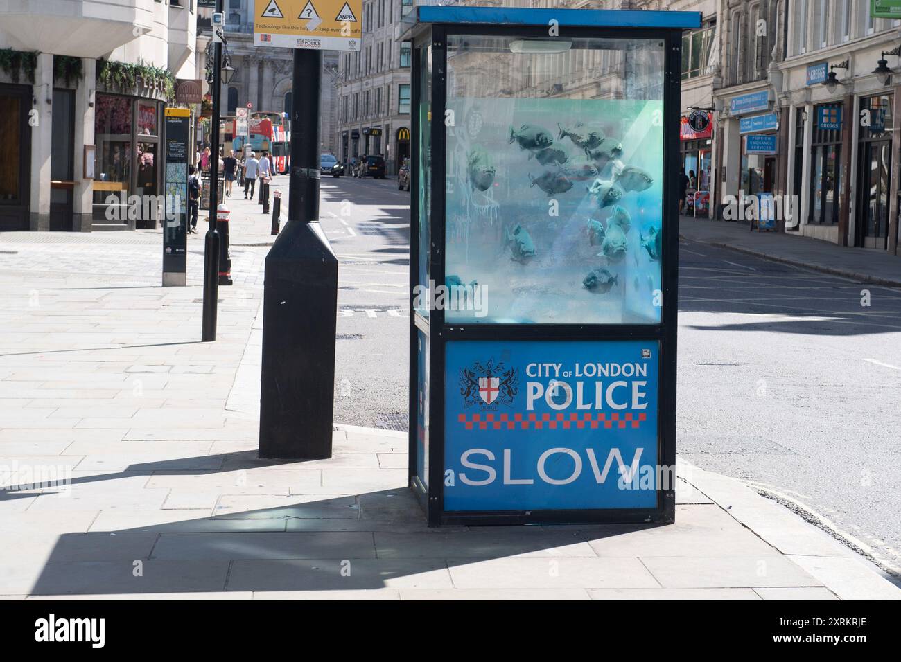 London, UK. 11th Aug, 2024. People take photos of Street Artist Banksy ...