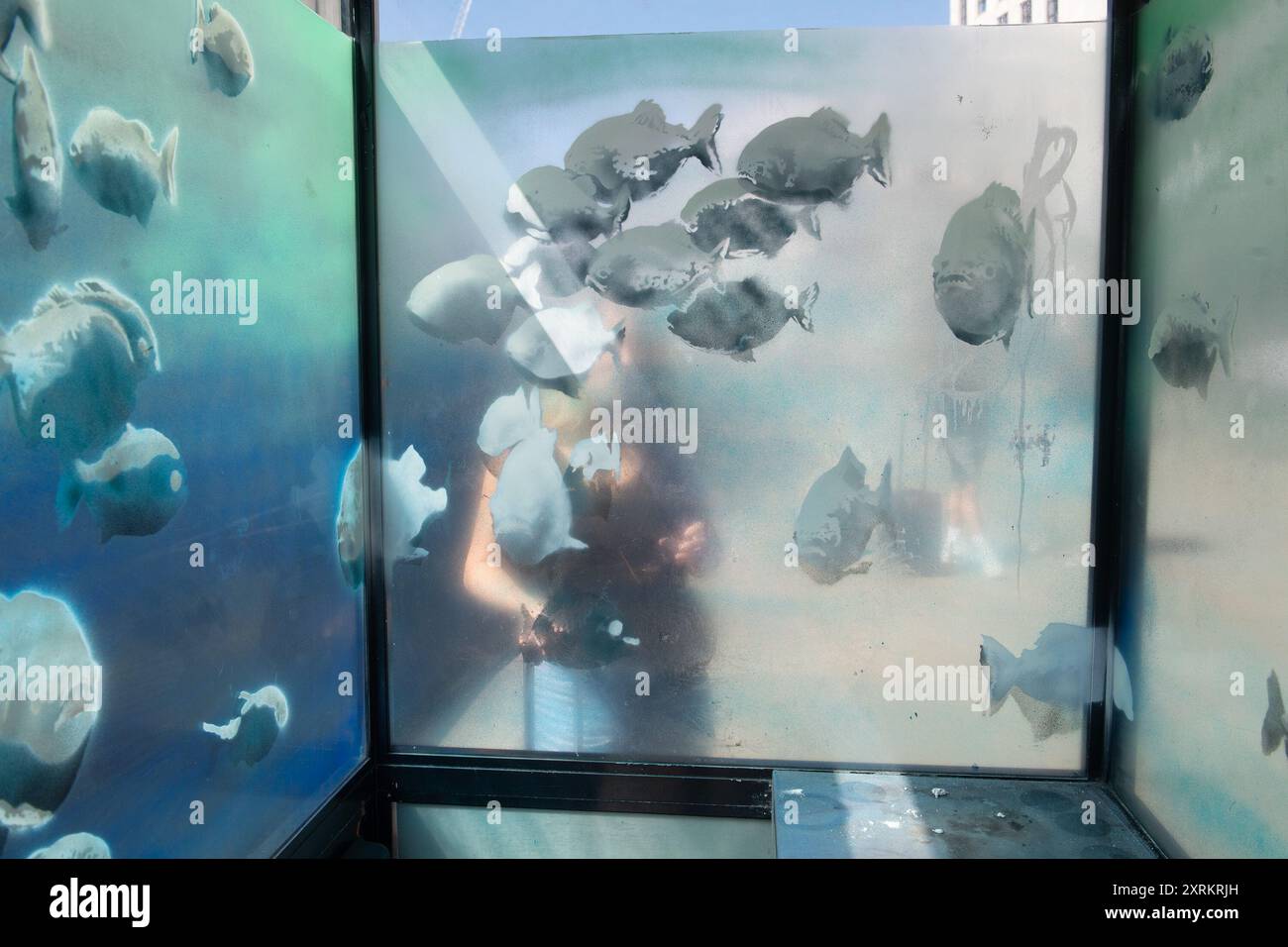 London, UK. 11th Aug, 2024. People take photos of Street Artist Banksy ...