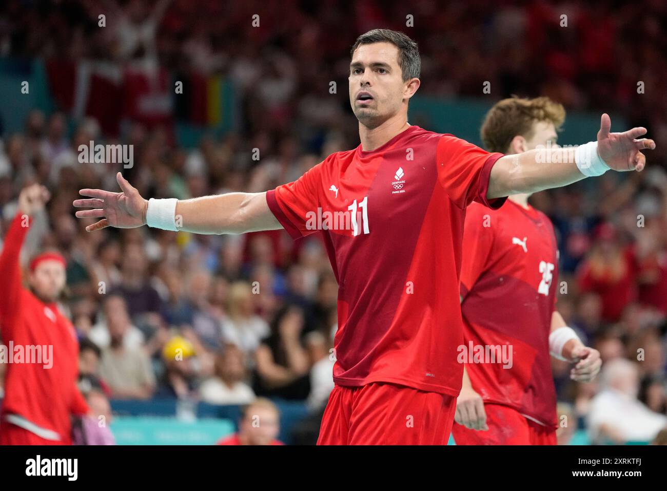 Denmark's Rasmus Lauge reacts during the gold medal handball match ...