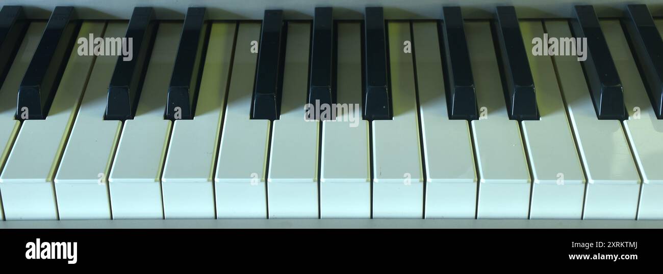 piano keyboard in house with shadow background and texture Stock Photo ...