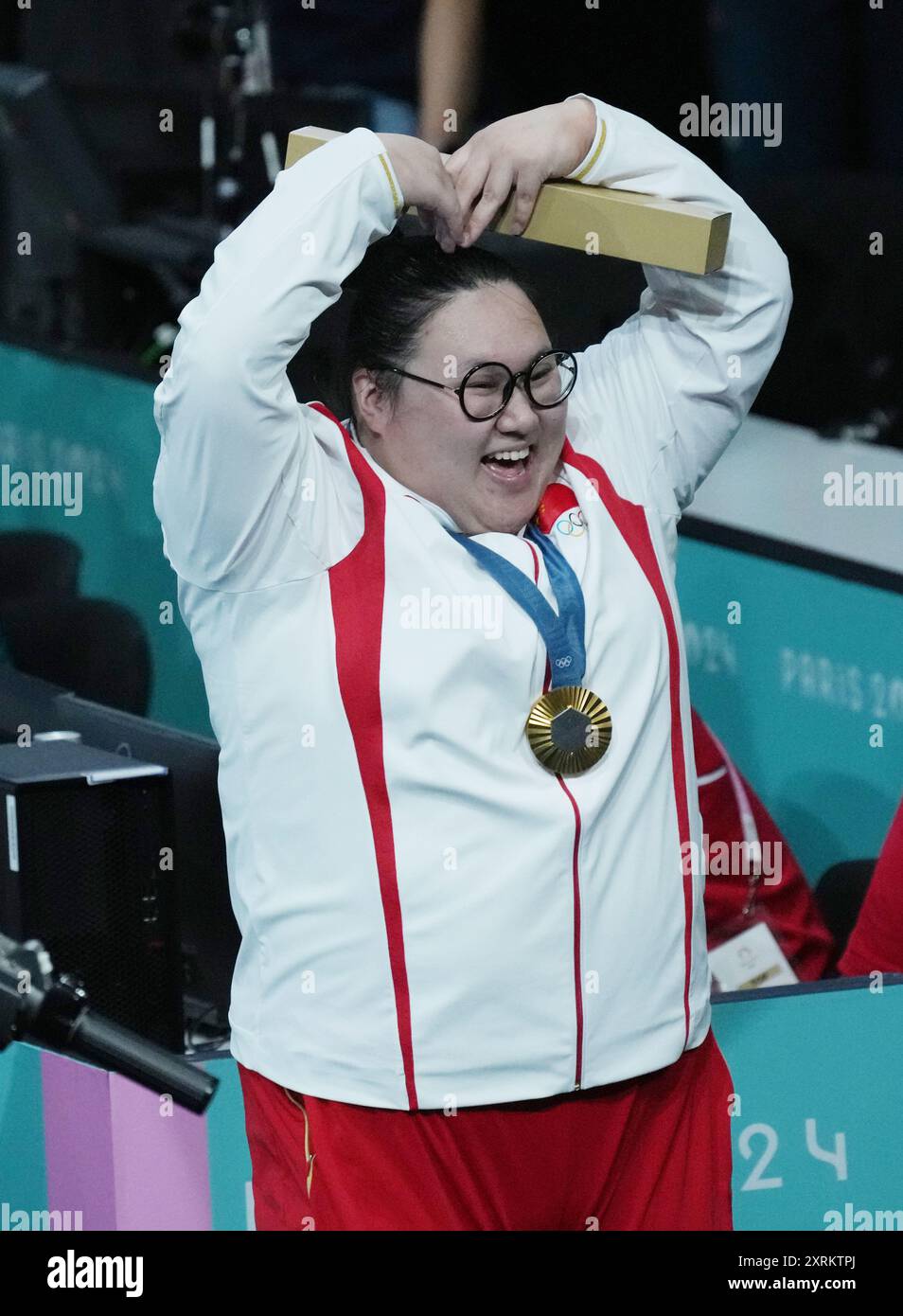 Paris, France. 11th Aug, 2024. Gold medalist Li Wenwen of China greets ...