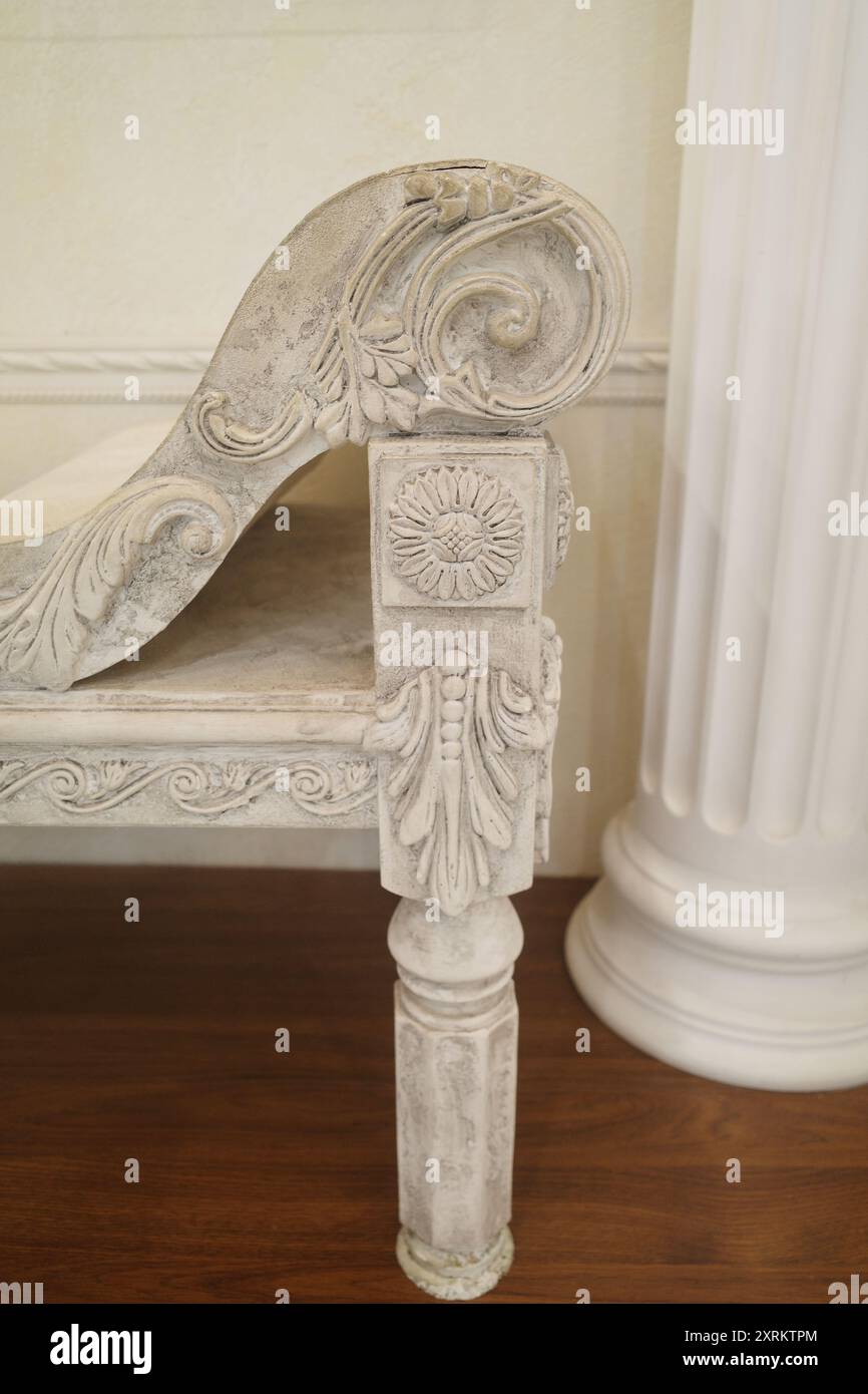 An element of an old bench made of light stone. History Stock Photo - Alamy