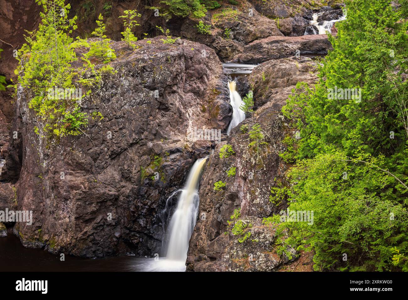 Copper Falls - A narrow waterfall in the woods scenic landscape Stock ...