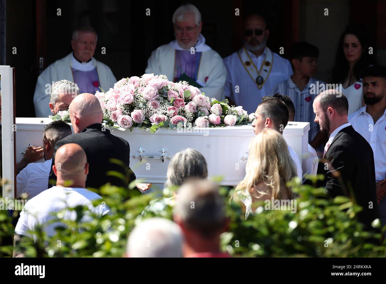 Pall bearers carry the coffin for the funeral of Southport stabbing ...