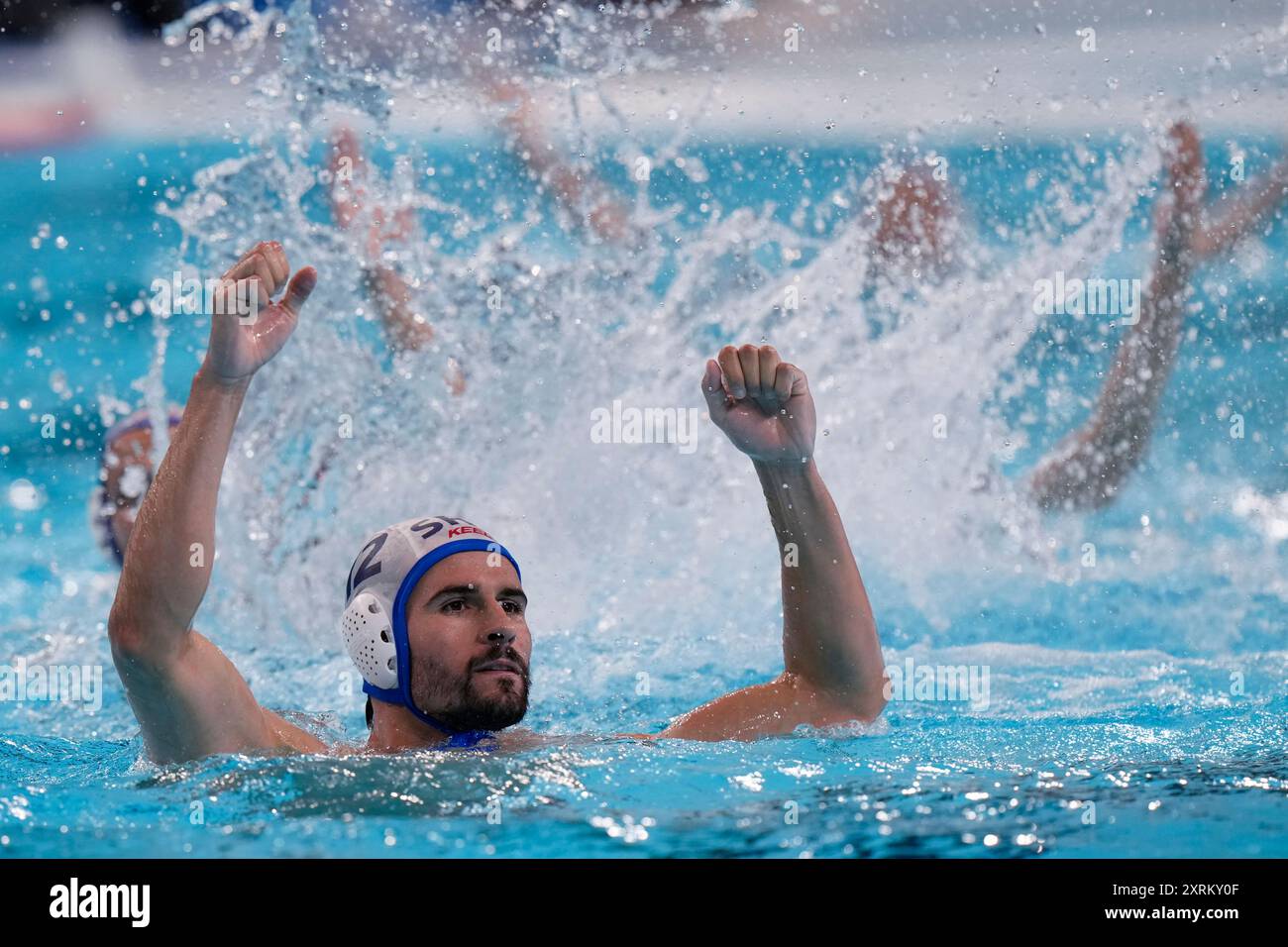 Serbia's Viktor Rasovic celebrates winning the men's water polo gold ...