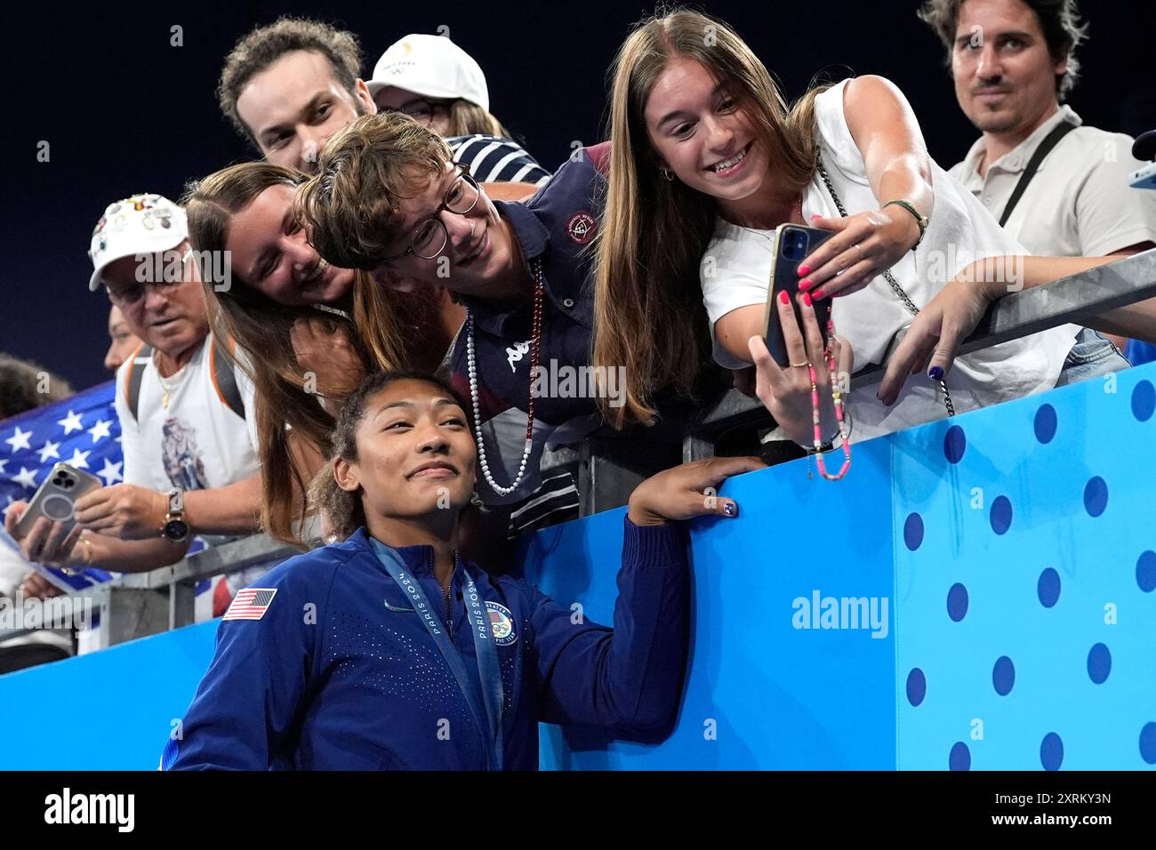 Fans take selfie with silver medalist Kennedy Alexis Blades, of the ...