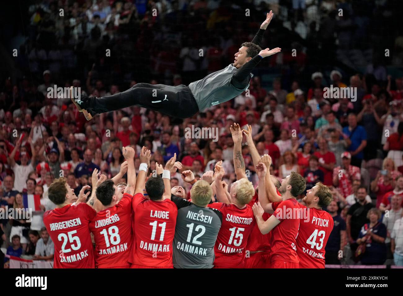 Denmark players toss Denmark goalkeeper Niklas Landin Jacobsen in the ...