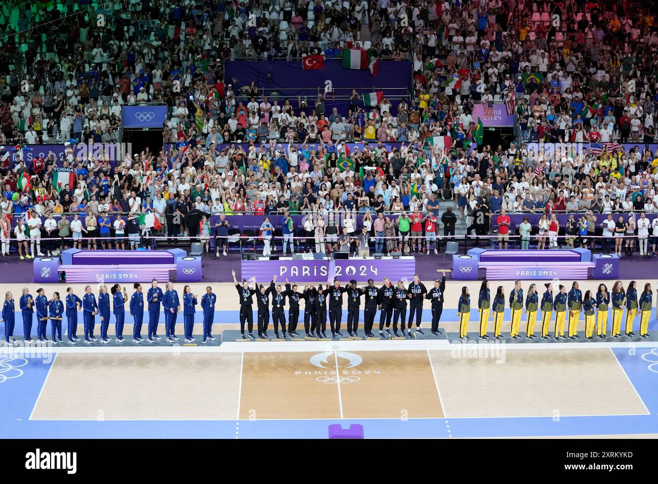 The gold medalist team of Italy, center, silver medalist United States ...