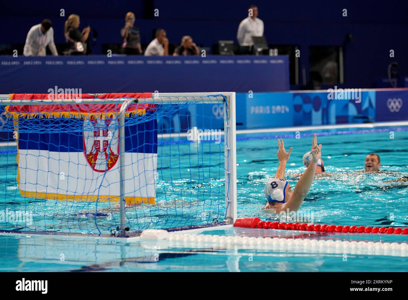 Serbia's team celebrates winning the men's water polo gold medal match ...