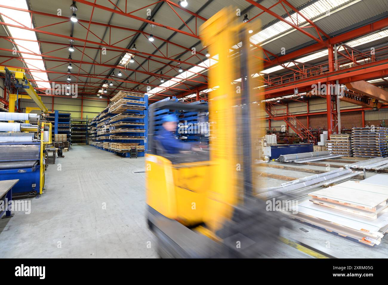 Sale and storage of industrial goods and steel in a factory hall Stock ...