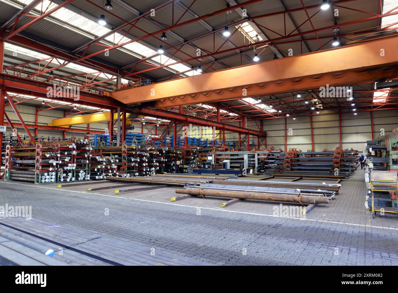 Sale and storage of industrial goods and steel in a factory hall Stock ...