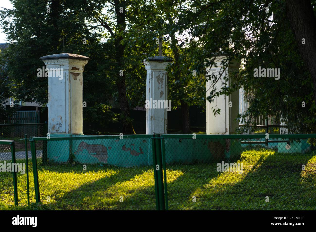The old columns of the entrance gate to the estate Stock Photo - Alamy