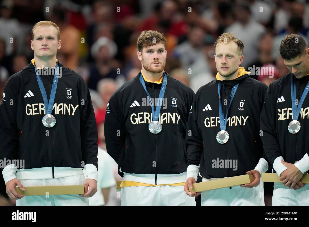 Germany players celebrate their silver medal after the gold medal ...