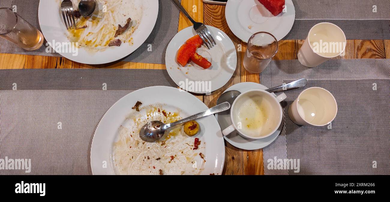Table glasses at end of meal hi-res stock photography and images - Alamy