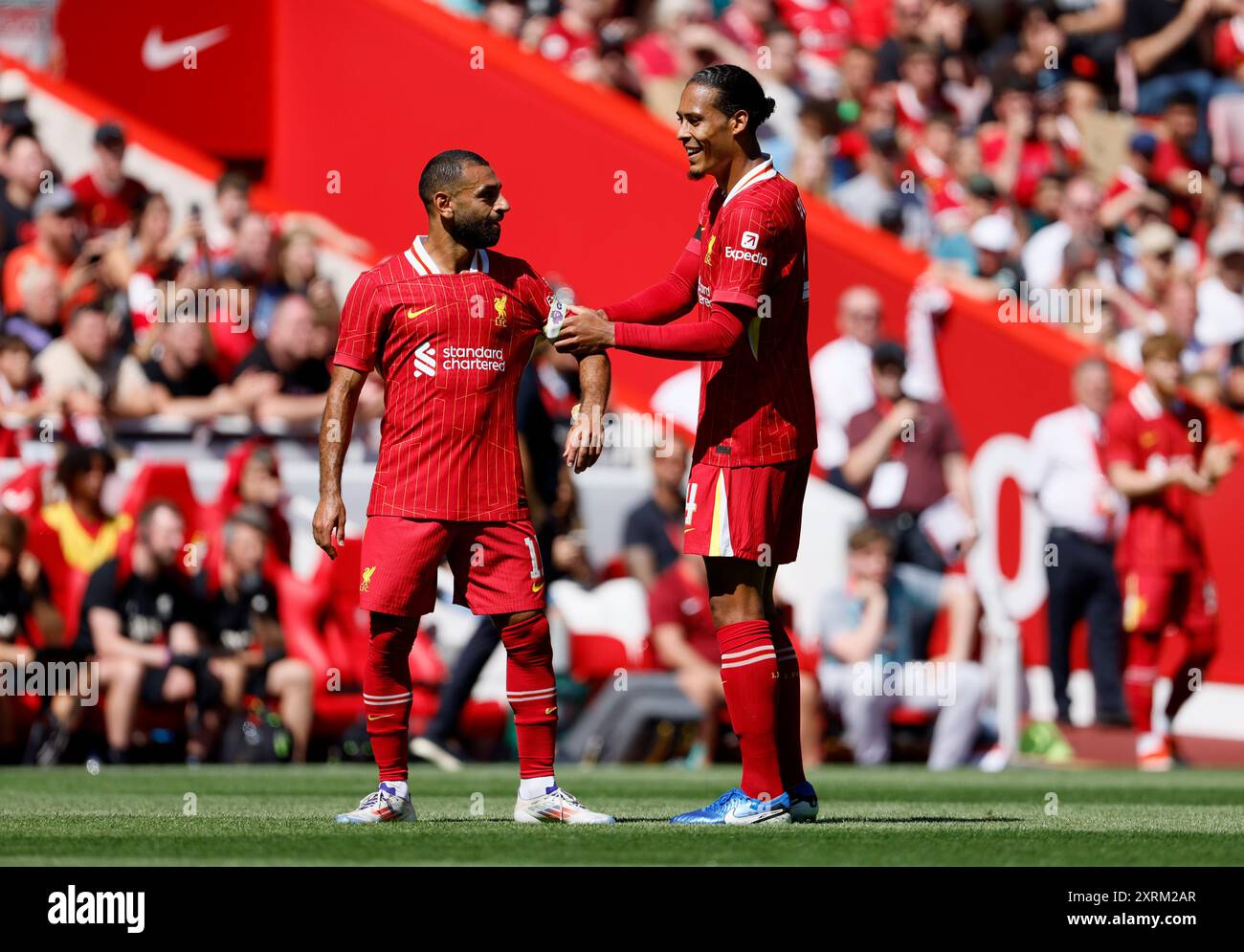 Liverpool's Virgil van Dijk and Mohamed Salah react following the pre ...