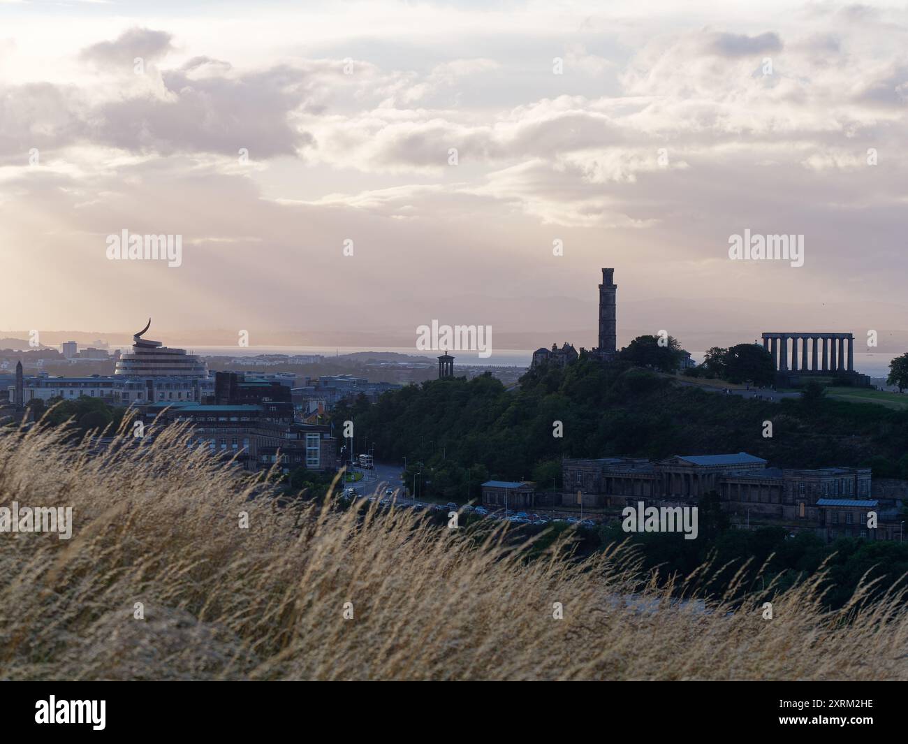 Salisbury Crags view towards Calton Hill with National Monument and ...