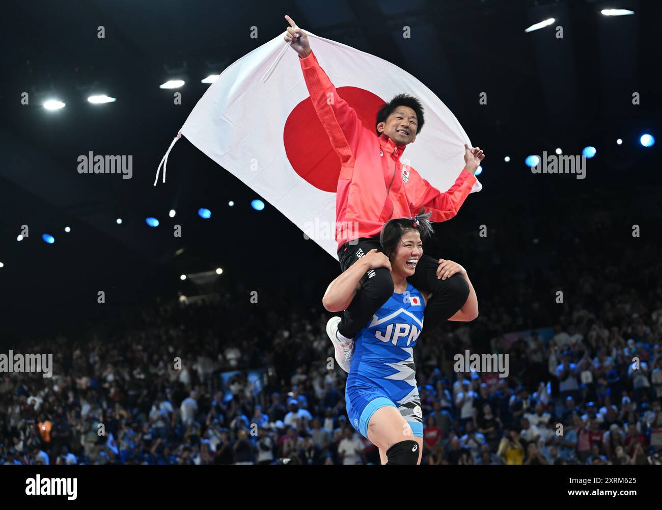 Paris, France. 11th Aug, 2024. Kagami Yuka (bottom) of Japan celebrates ...