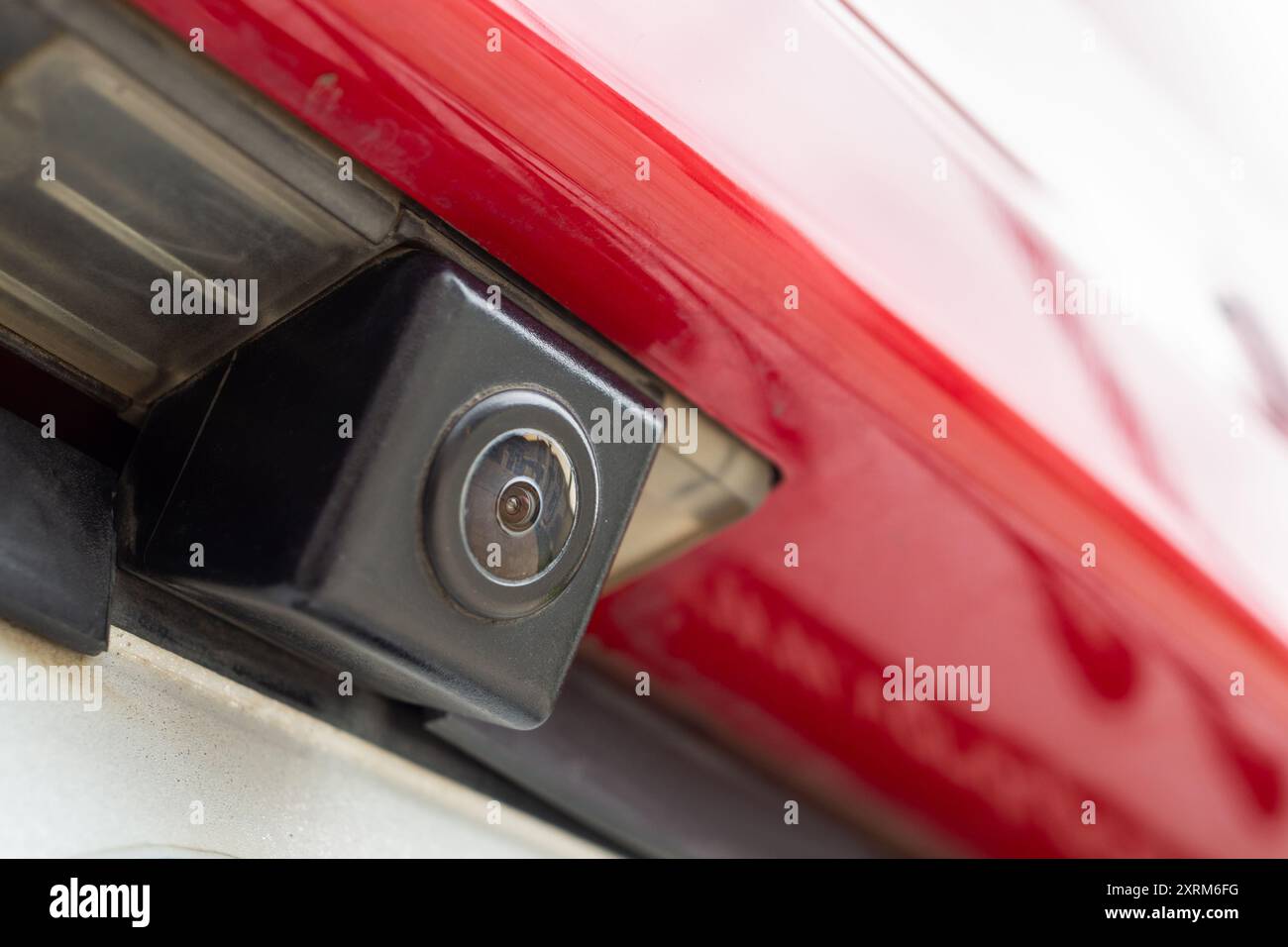 Red car rear view camera close up for parking assistance Stock Photo ...