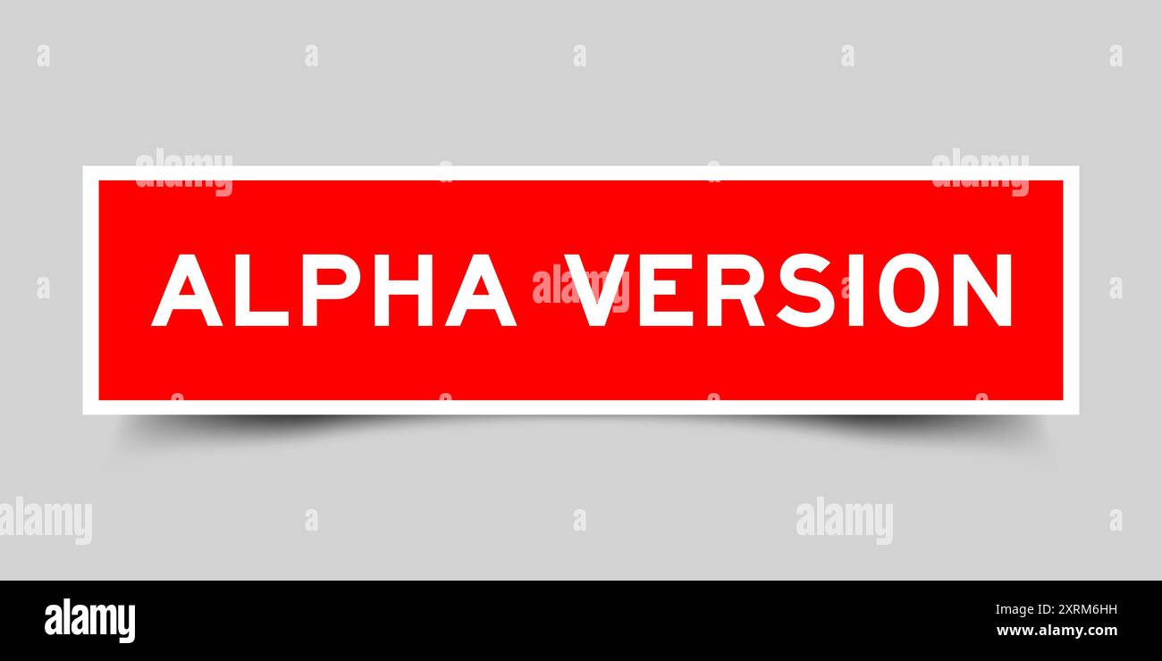 Square sticker label with word alpha version in red color on gray ...