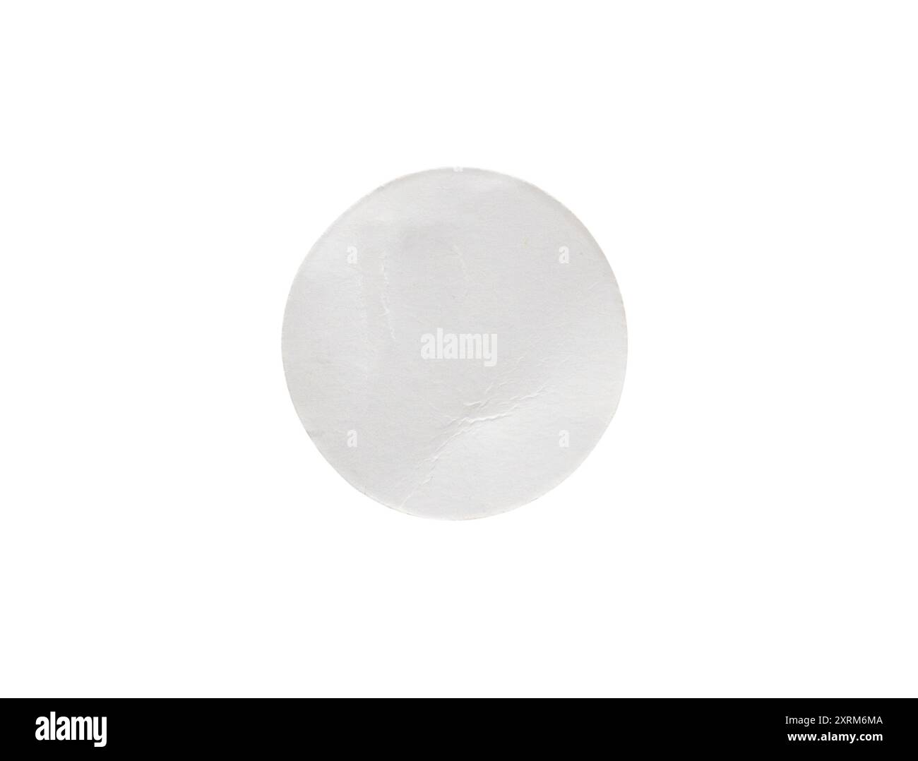 Blank white round paper sticker label isolated on white background with ...