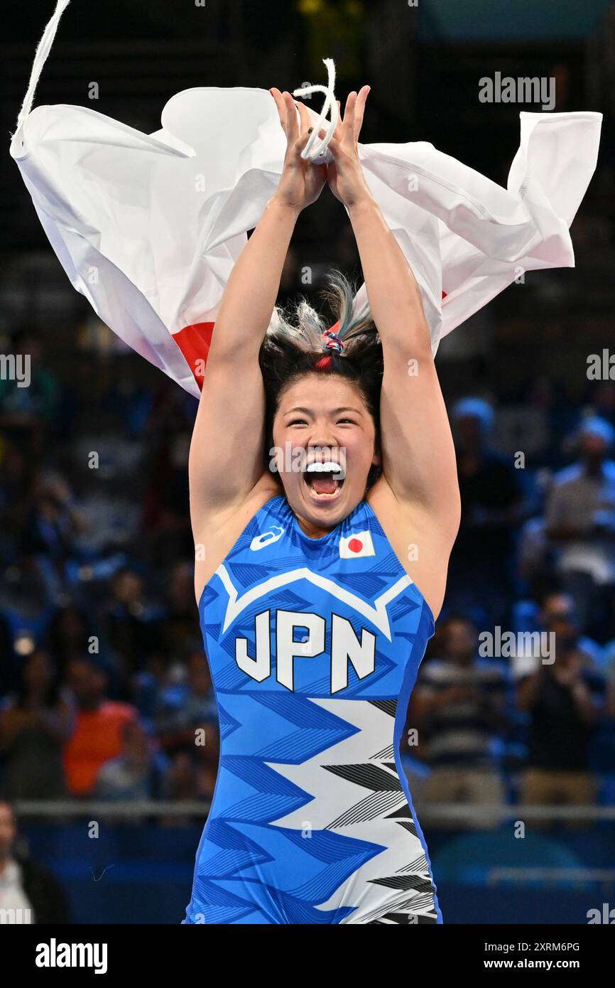 CAGAMI Yuka (JPN) Japan celebrating the gold medal with the Japan flag, Wrestling Women's ...