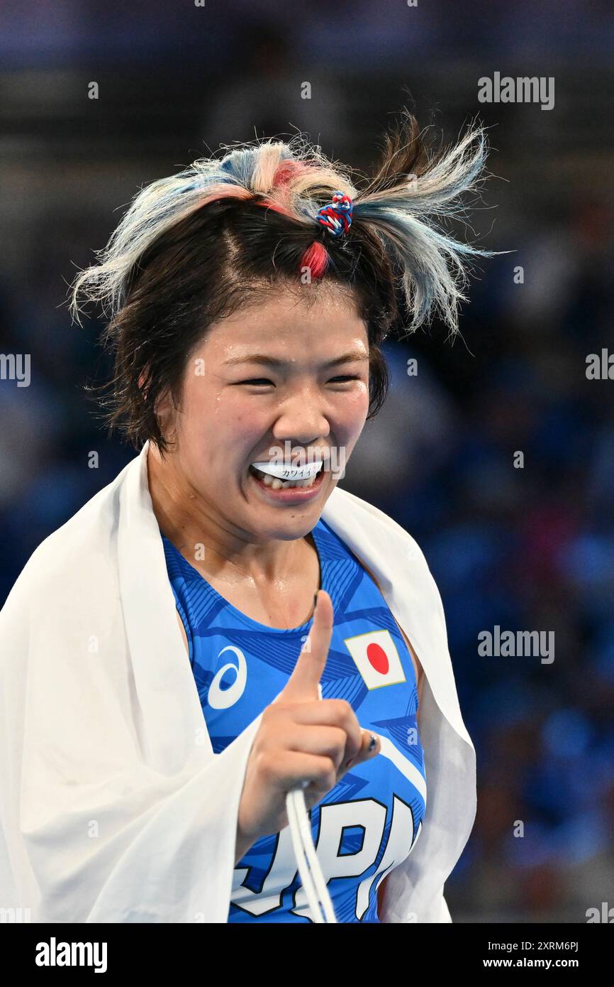 CAGAMI Yuka (JPN) Japan celebrating the gold medal with the Japan flag, Wrestling Women's ...
