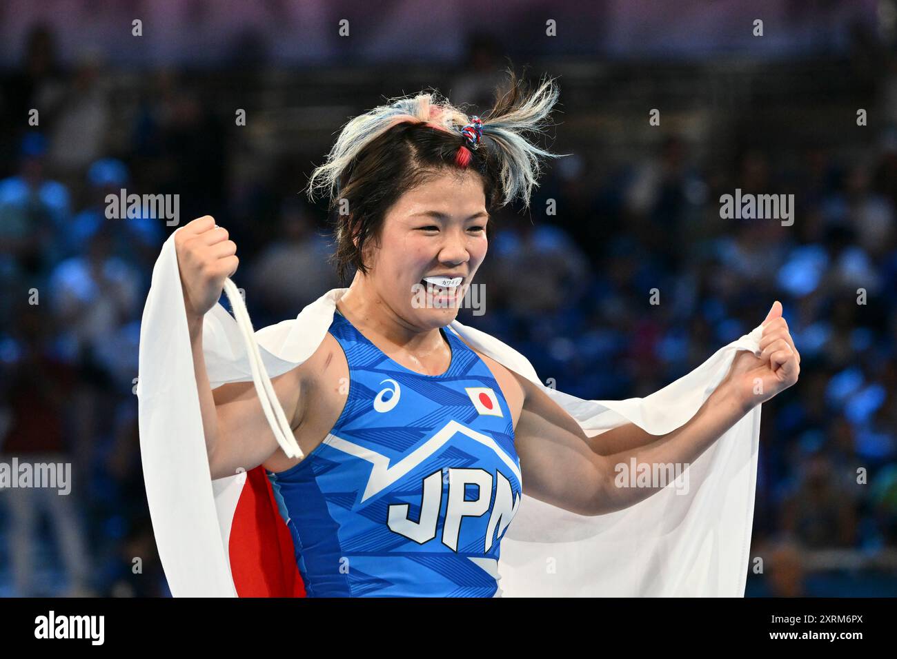 CAGAMI Yuka (JPN) Japan celebrating the gold medal with the Japan flag, Wrestling Women's ...