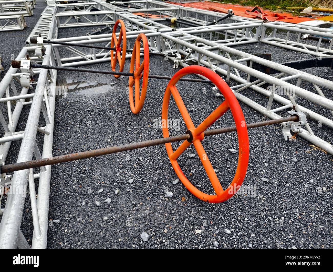 Wheels on a metal structure for stage mounting Stock Photo - Alamy