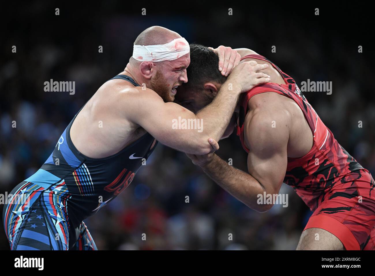 Paris, France. 11th Aug, 2024. Amirali Azarpira (R) of Iran competes ...